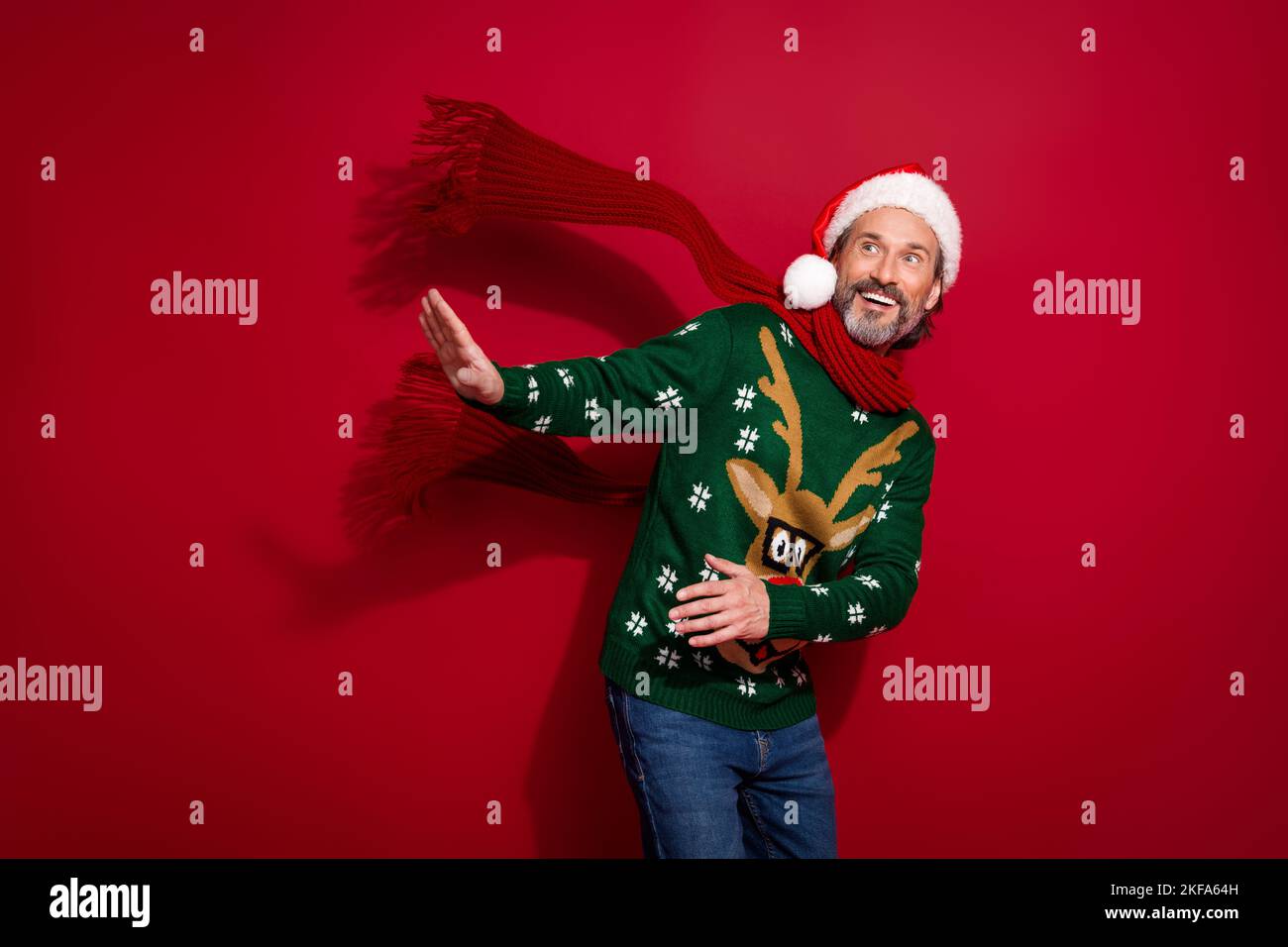 Photo of excited positive person look empty space arm palm waving ...