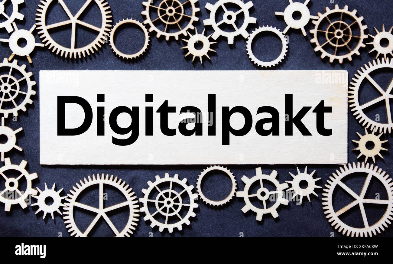 Digitalpakt lettering and wooden gears Stock Photo - Alamy