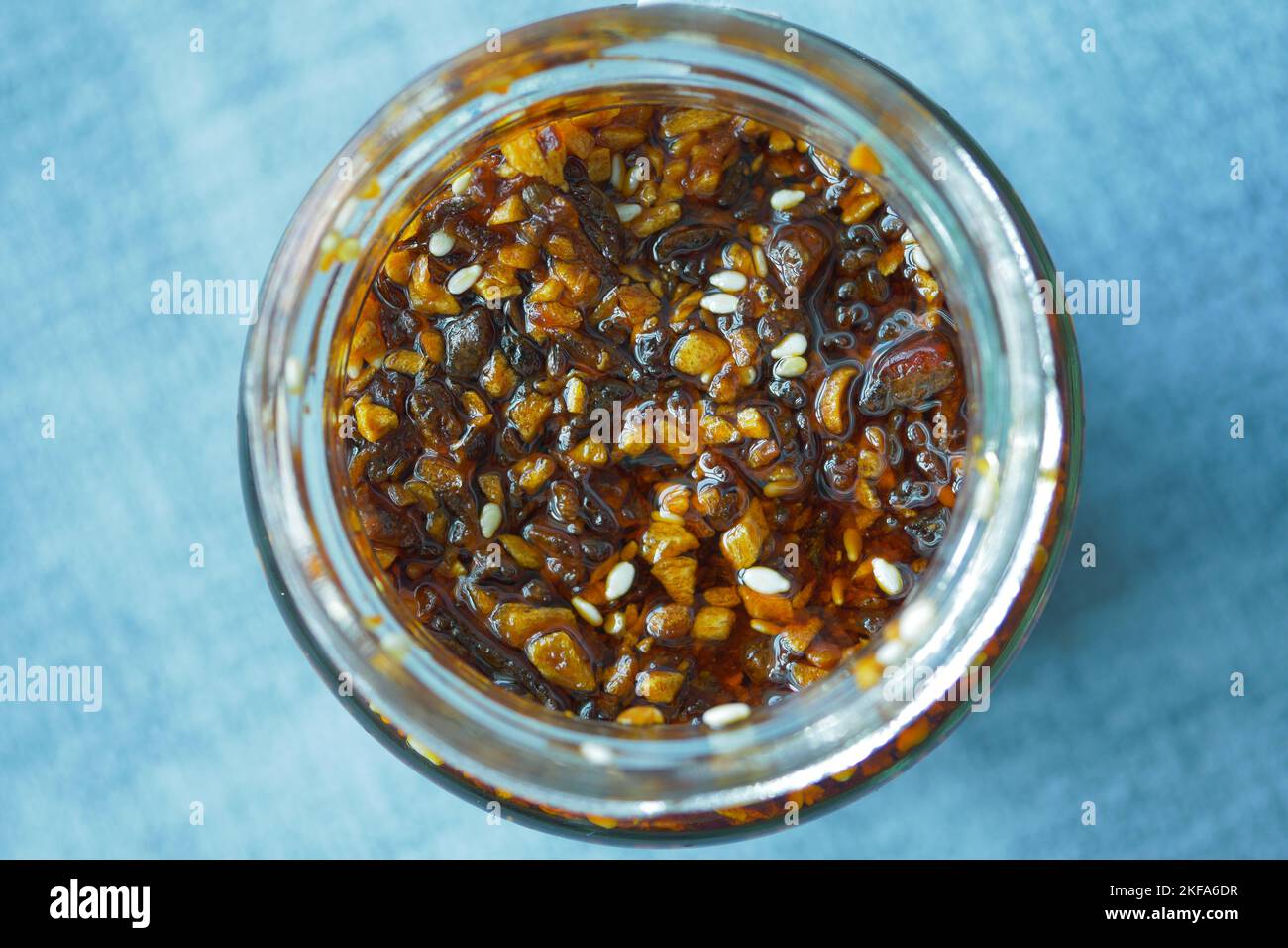 chili and garlic flakes in a container Stock Photo - Alamy