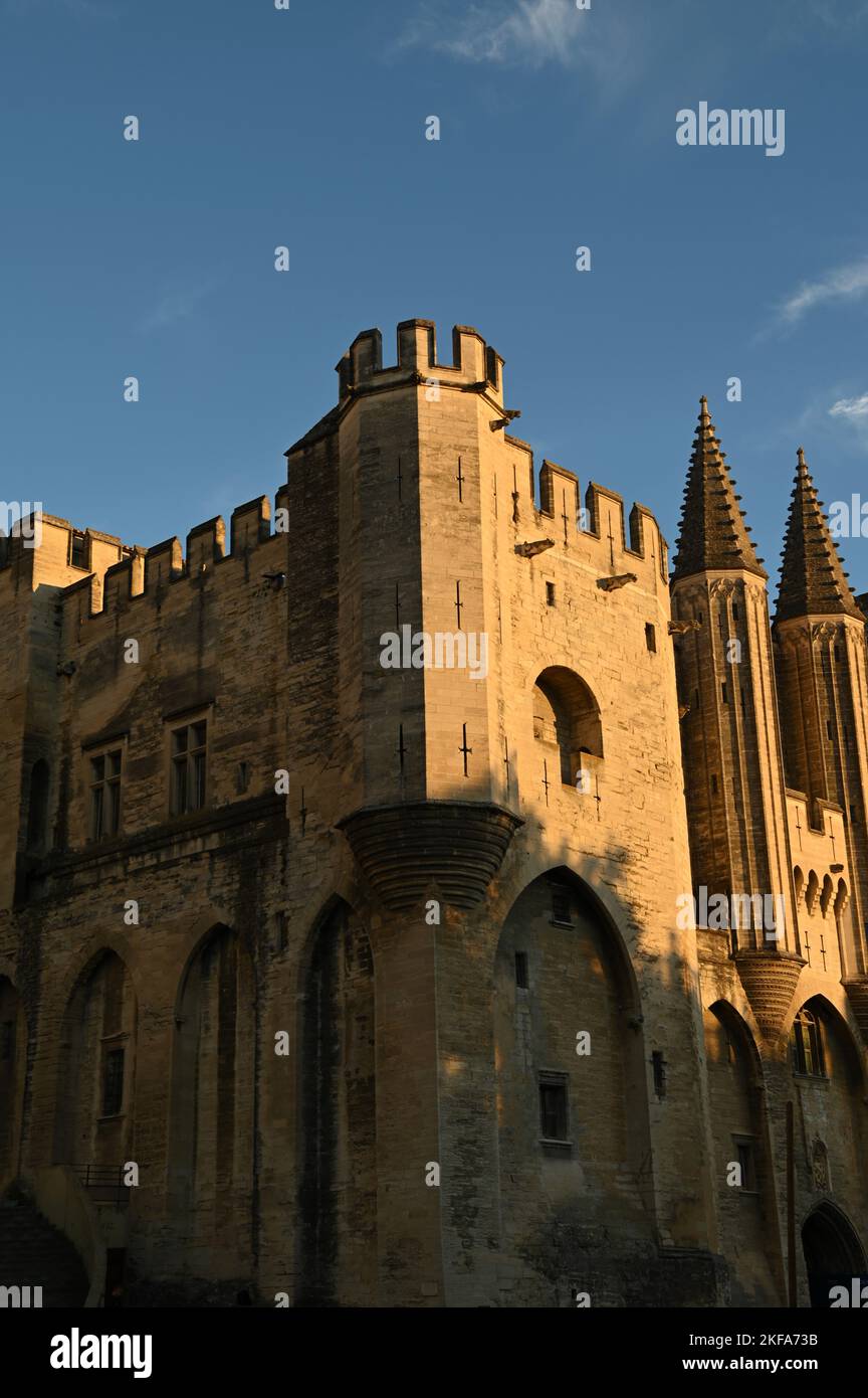 An exterior view of the impressive architecture of the Palais des Papes ...