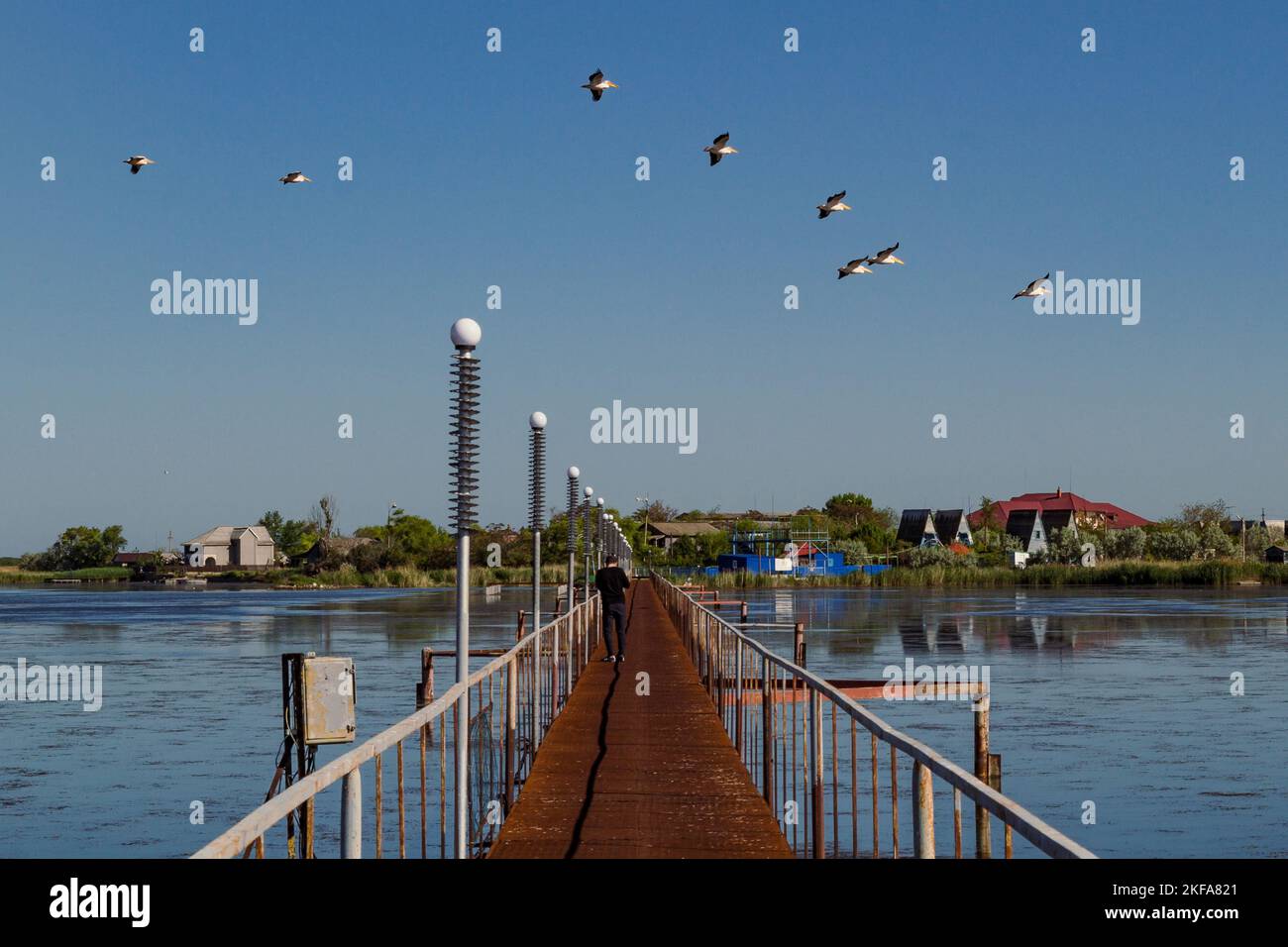 Bridge to coastal village landscape photo. Beautiful nature scenery ...