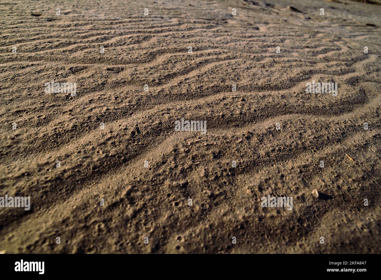 Close up wet sand concept photo. Ground after waterfall. Front view ...