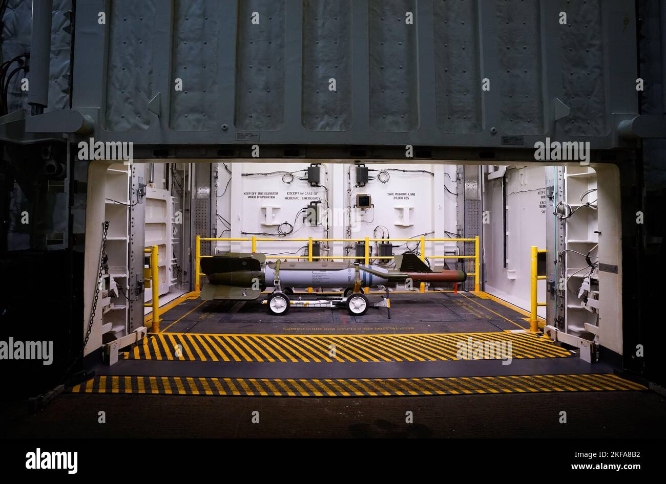 A view of a trainer bomb in the Advanced Weapon Elevator on board the ...