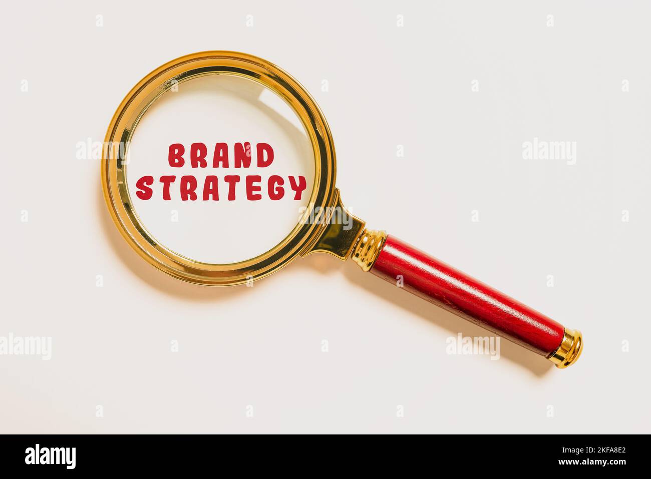 Hand writing sign Brand Strategy. Internet Concept longterm plan ...