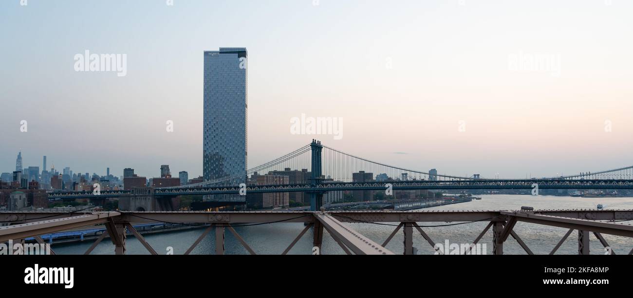 Skyscrapers at dusk of Manhattan as seen from the Brooklyn Bridge Stock ...