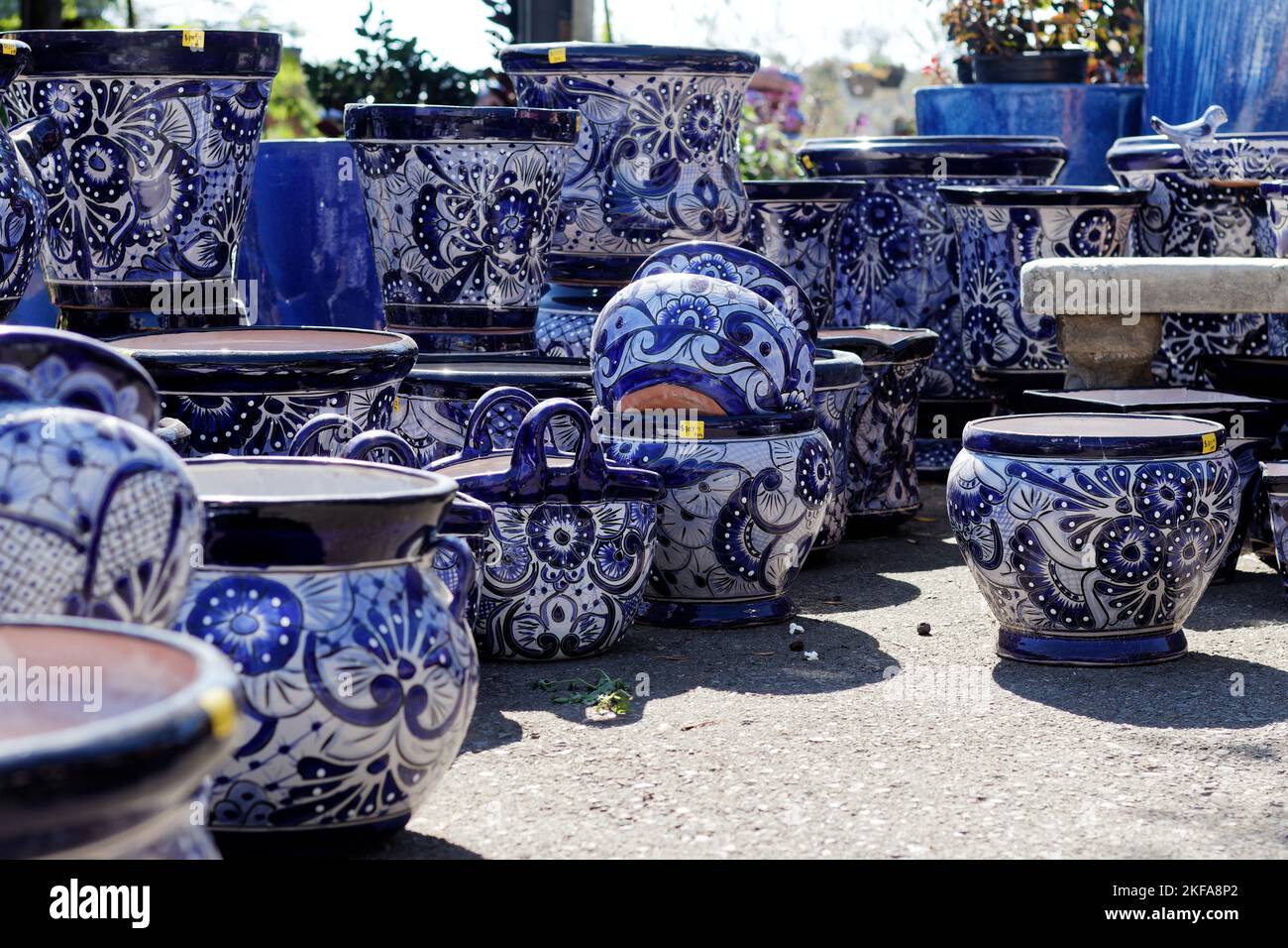 A closeup of set of mexican traditional dishes with blue drawings ...