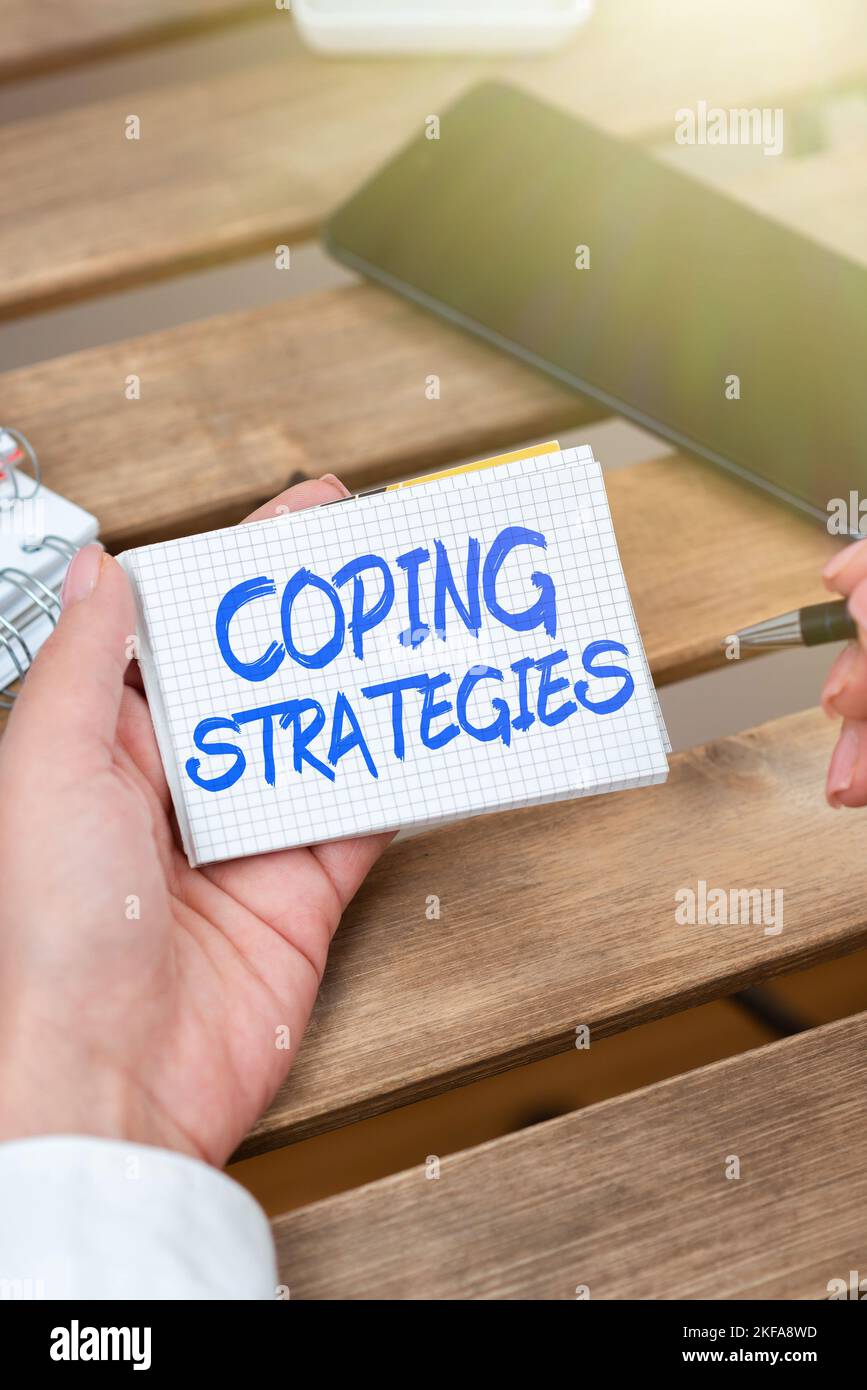 Sign displaying Coping Strategies. Word for general plan or set of ...