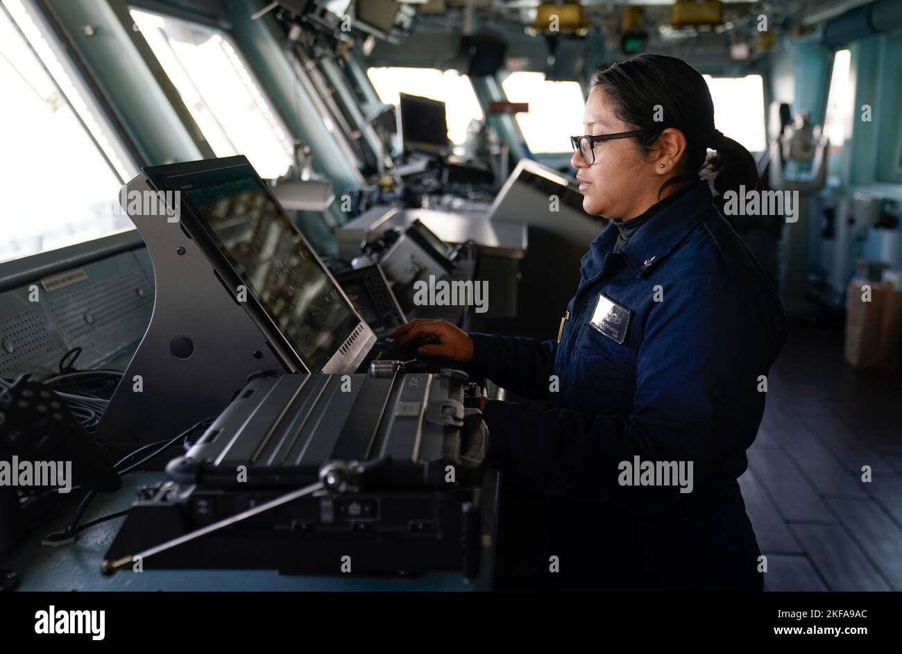 A crew member works on the bridge of the USS Gerald R. Ford, the 'world ...