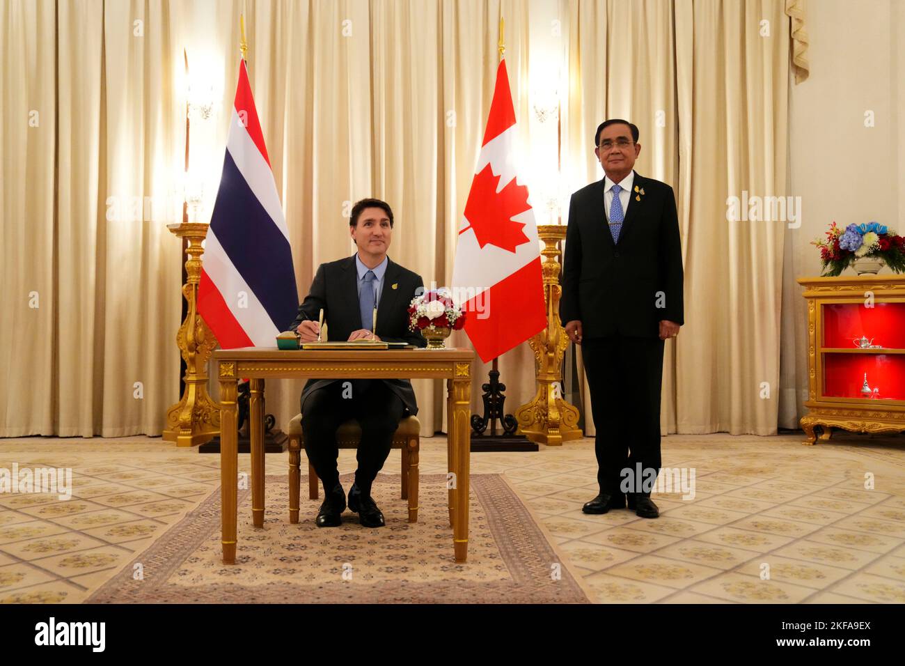 Bangkok, Thailand, Nov. 17, 2022. Prime Minister Justin Trudeau signs ...