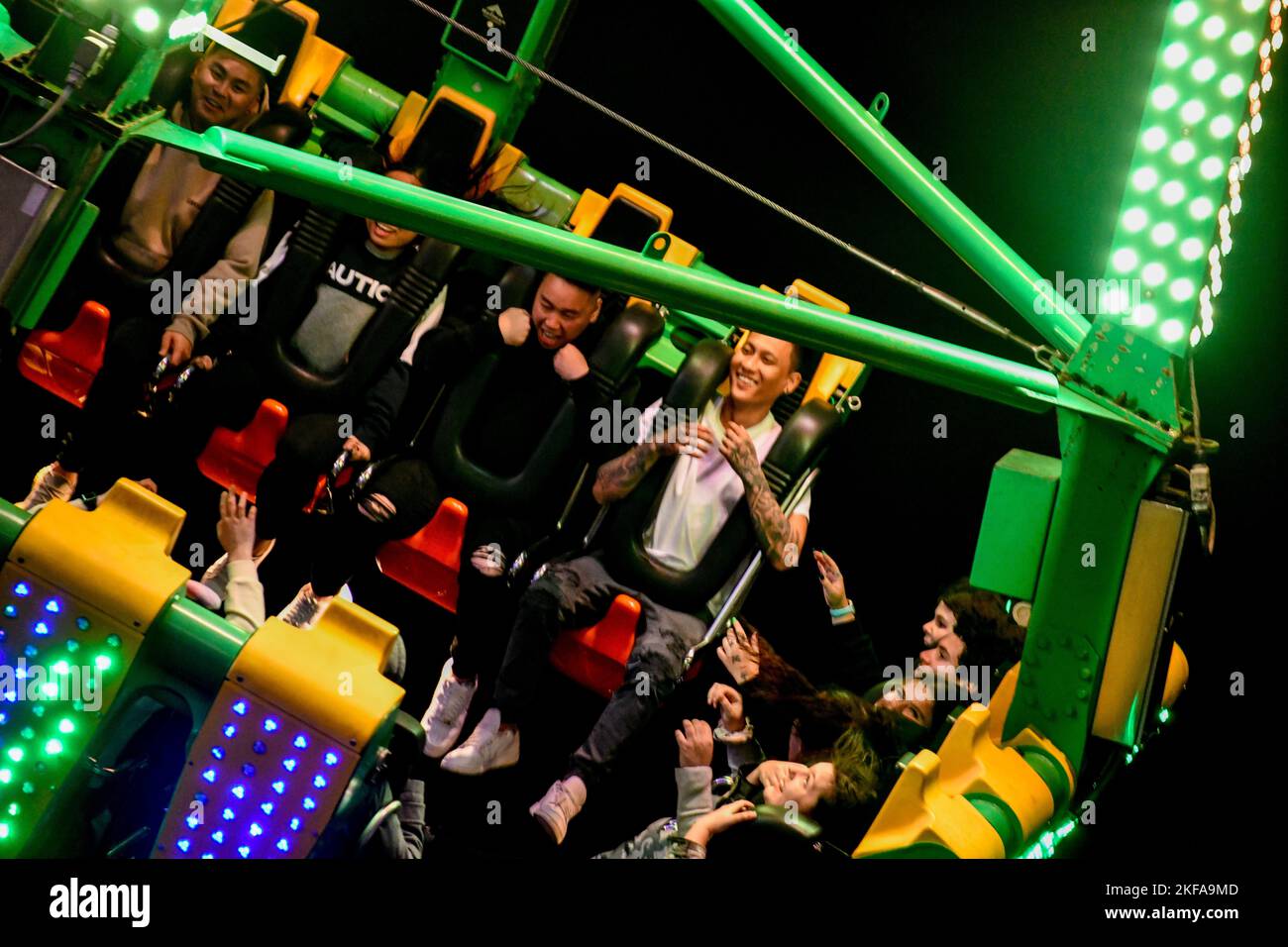 People Enjoying Fast Spinning Amusement Rides at The Royal Melbourne ...