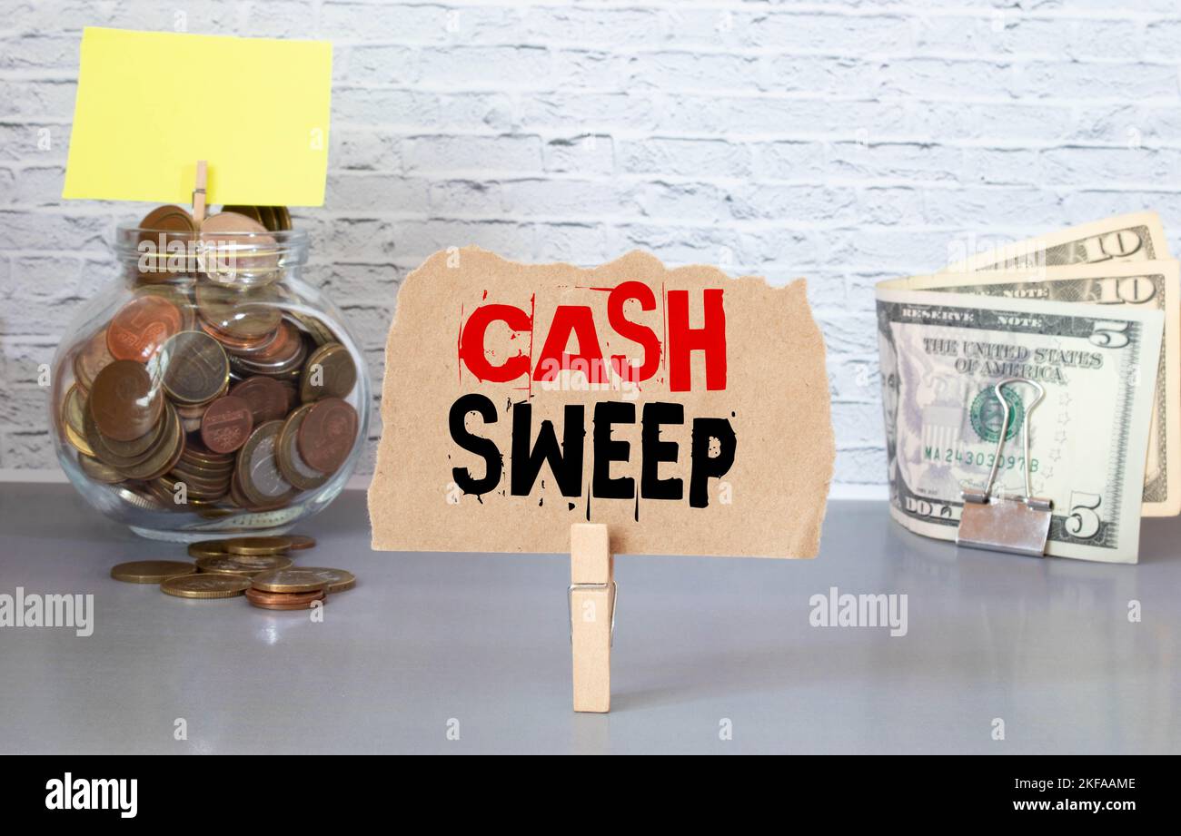 Cash sweep lettering on craft paper, money in the background Stock ...
