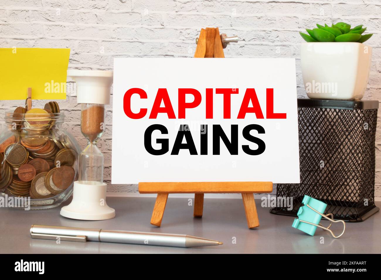 Text capital gain on the short note texture background Stock Photo - Alamy