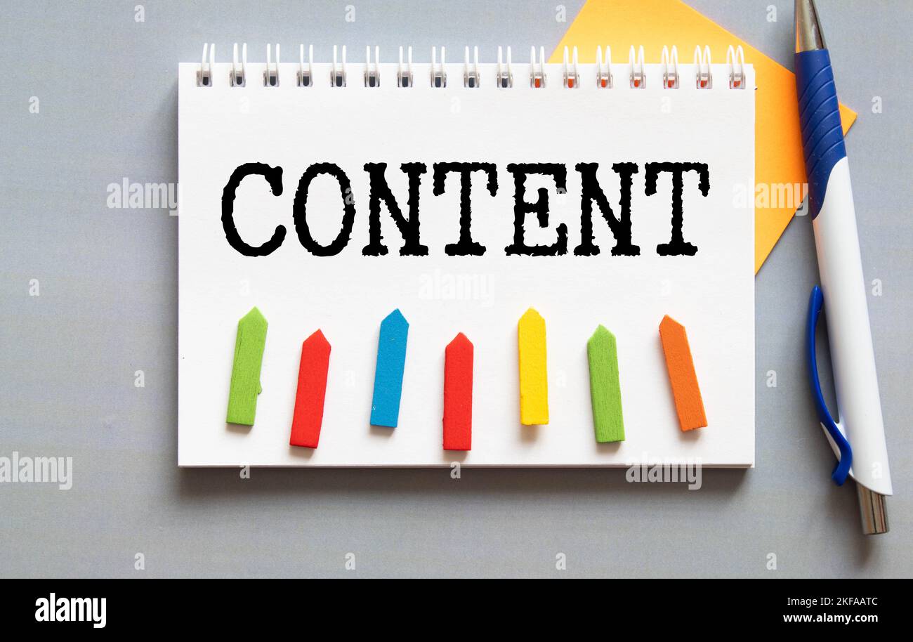 Content. text on yellow paper near torn green paper Stock Photo - Alamy