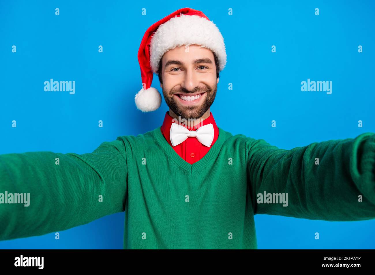 Photo of cheerful positive man toothy smile make selfie record video ...