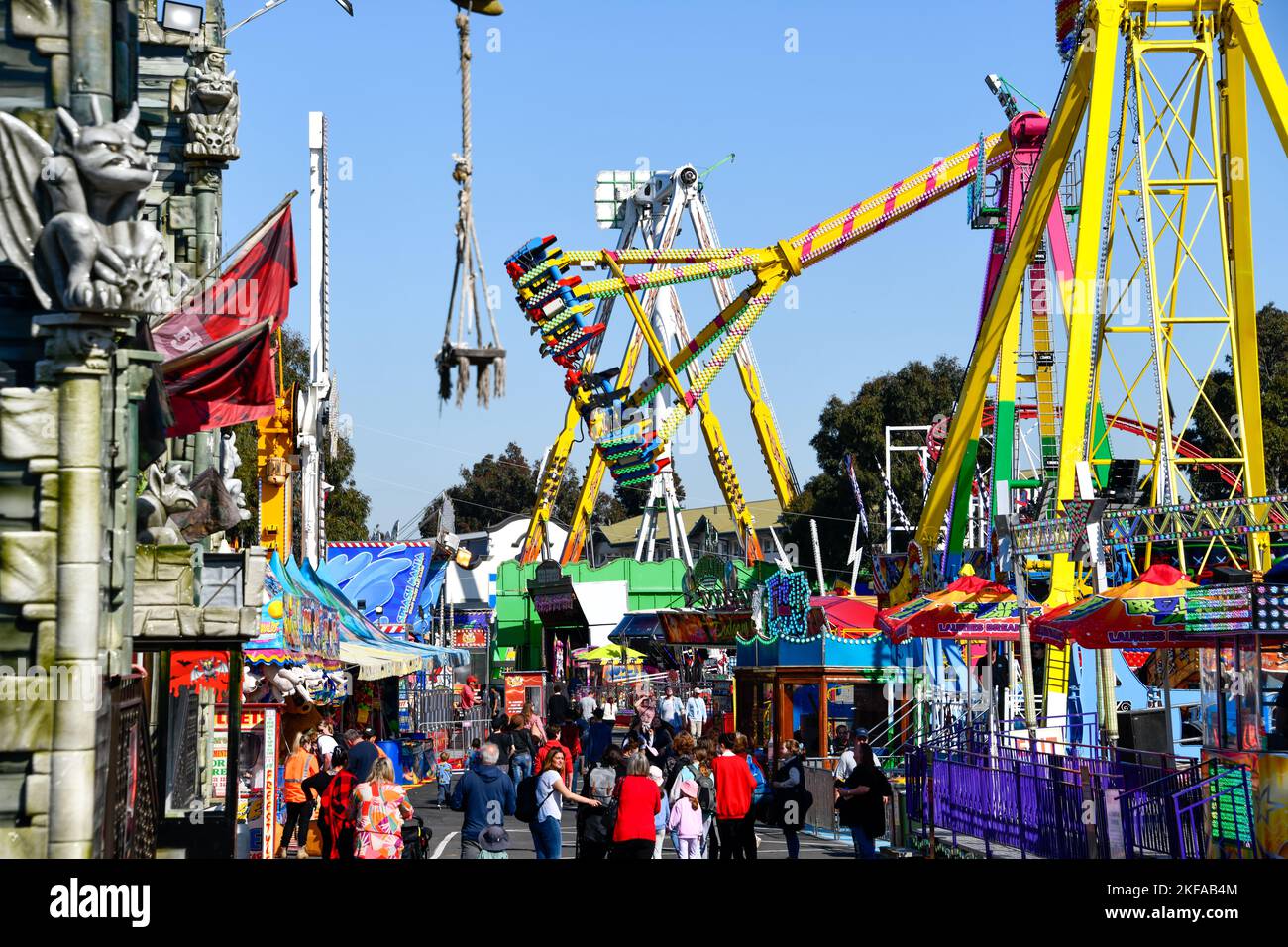 People Enjoying Fast Spinning Amusement Rides at The Royal Melbourne ...