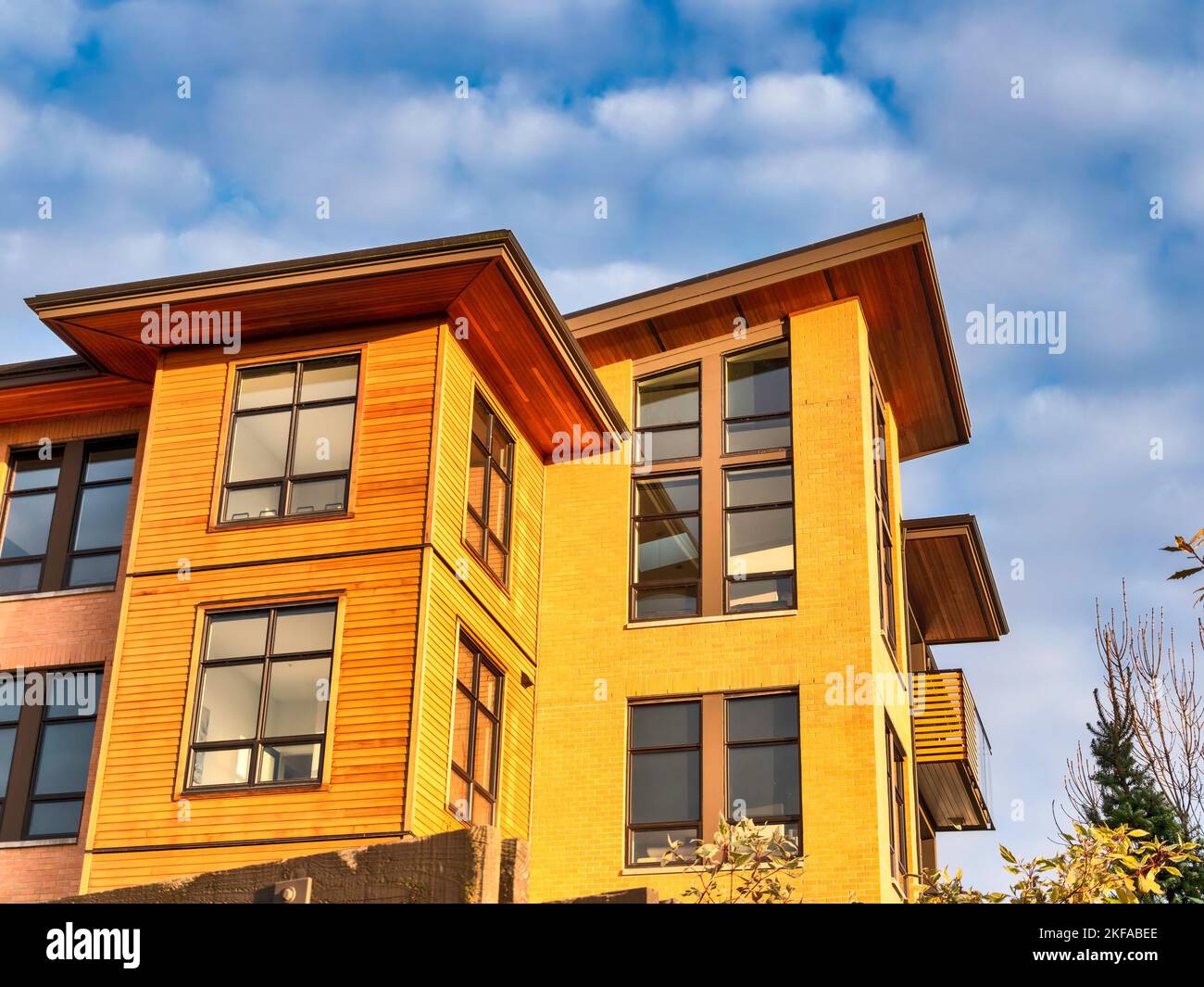 Top of residential building in golden sunset light Stock Photo - Alamy