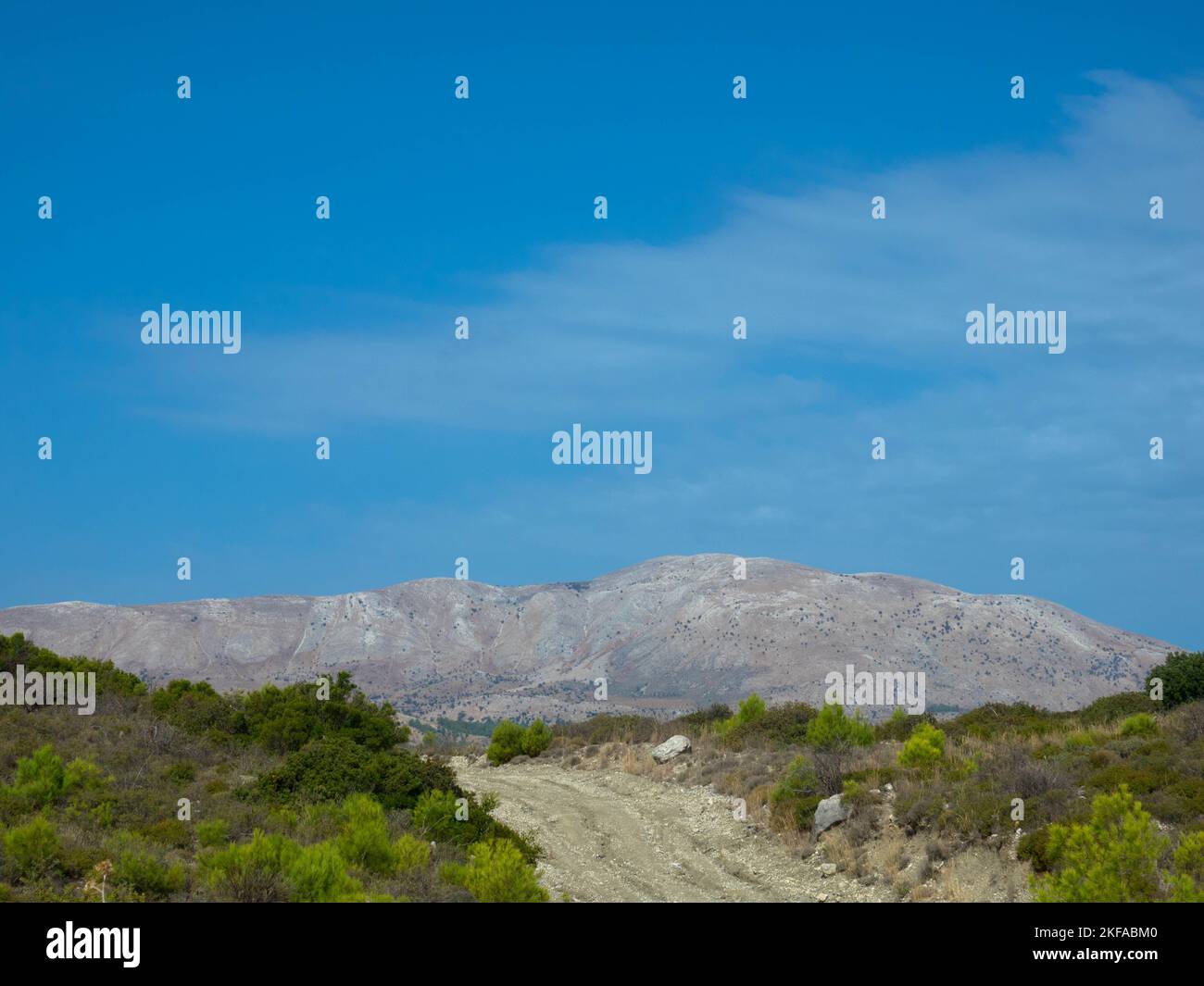 Sandy country road, 4x4 off-road trail to the peak of Attavyros ...