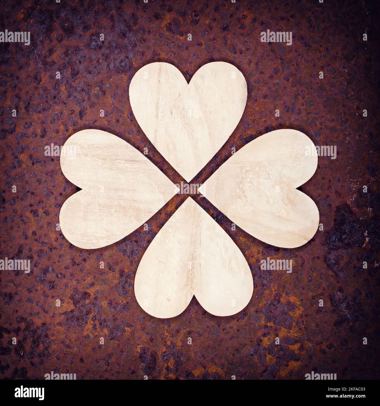 Wooden heart pattern on old rusted background Stock Photo - Alamy