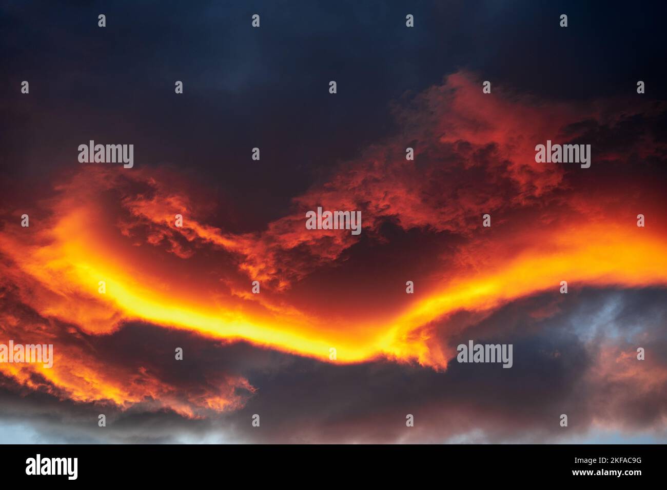 An amazing shot of a dramatic orange sunset Stock Photo - Alamy