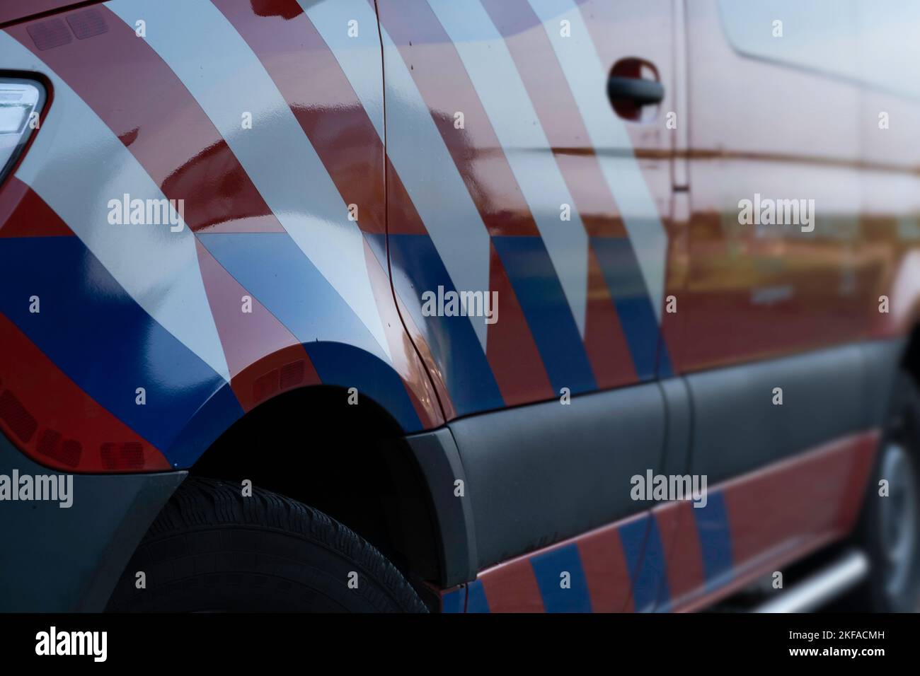 Standard colors (white with blue and red stripes) of a Dutch fire truck ...