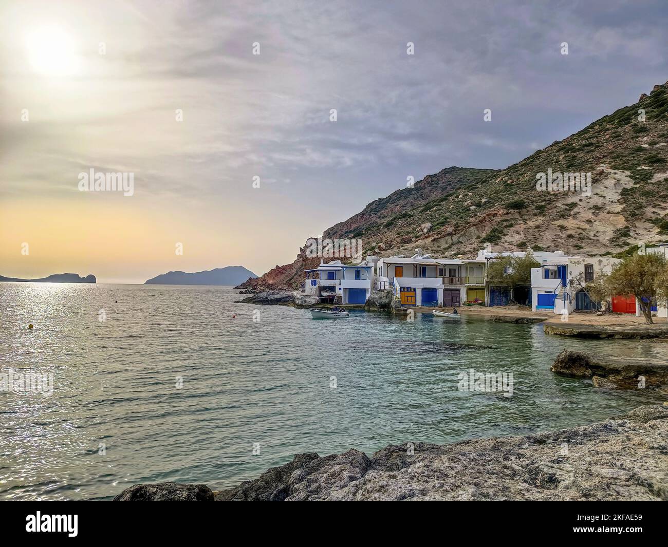 The view of the sea and a Mediterranean fishing village on the shore ...