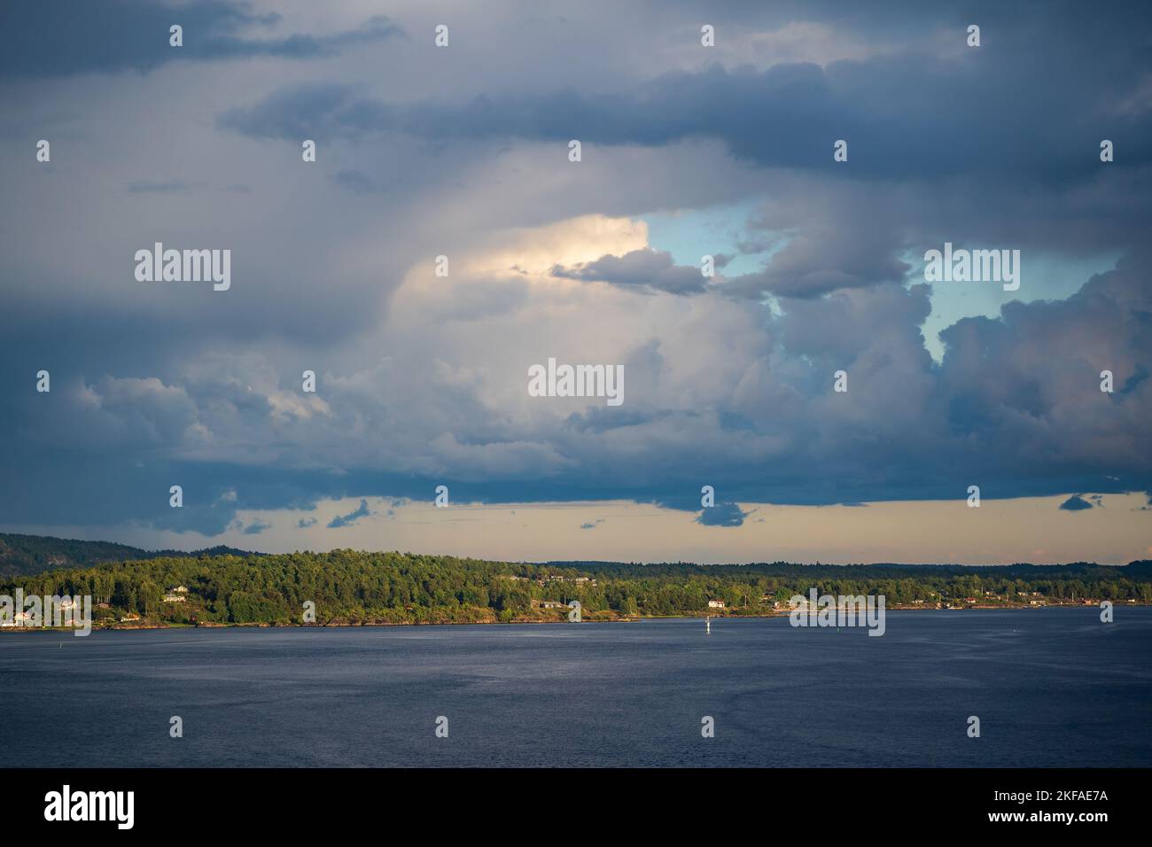 A beautiful shot of mesmerizing cloudy sky over forested fields Stock ...