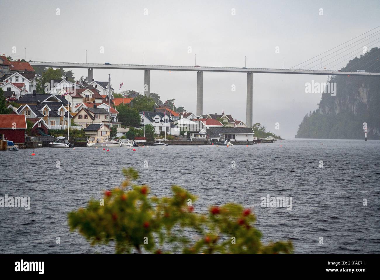A coastal city with a bridge in the background Stock Photo - Alamy
