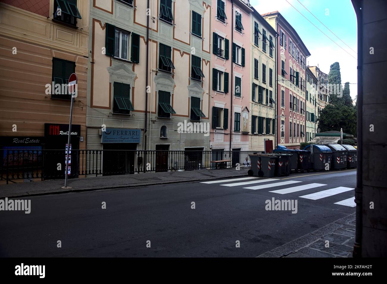 Street with tall residentail building on a cloudy day Stock Photo - Alamy
