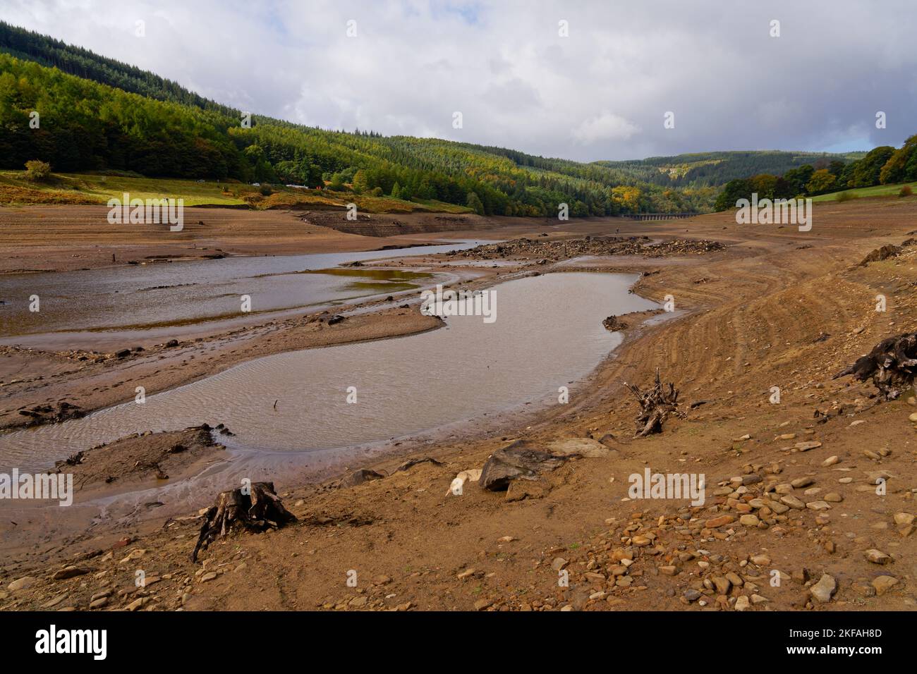 Dark rain clouds begin to gather over an almost empty Ladybower ...