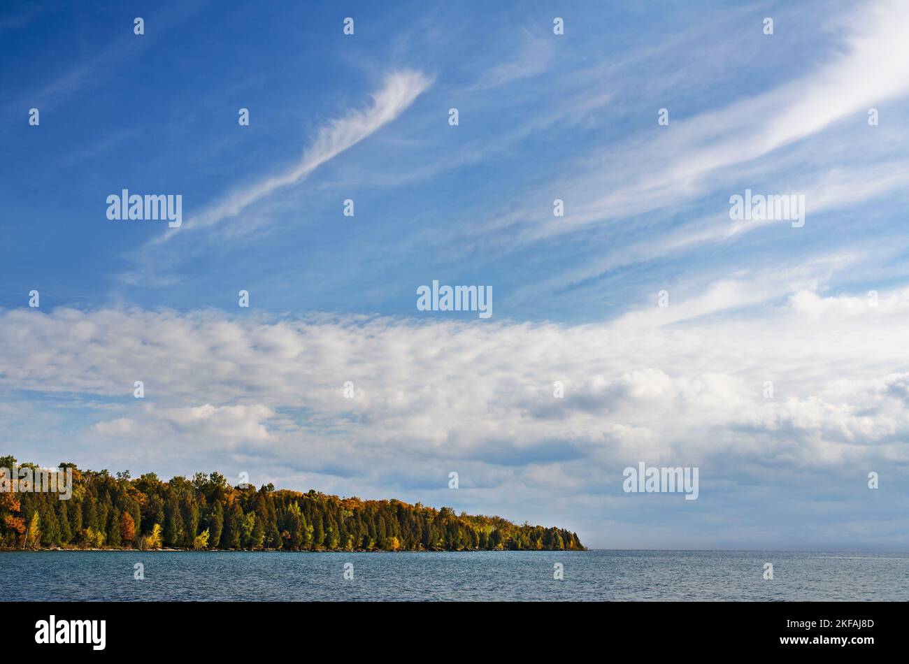 The shore of Newport Bay shows autumn color, Lake Michigan, Door County ...