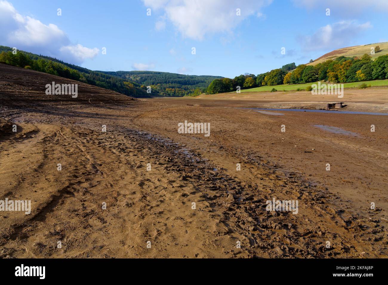 Standing on the muddy bottom of the Ladybower reservoir in Derbyshire ...