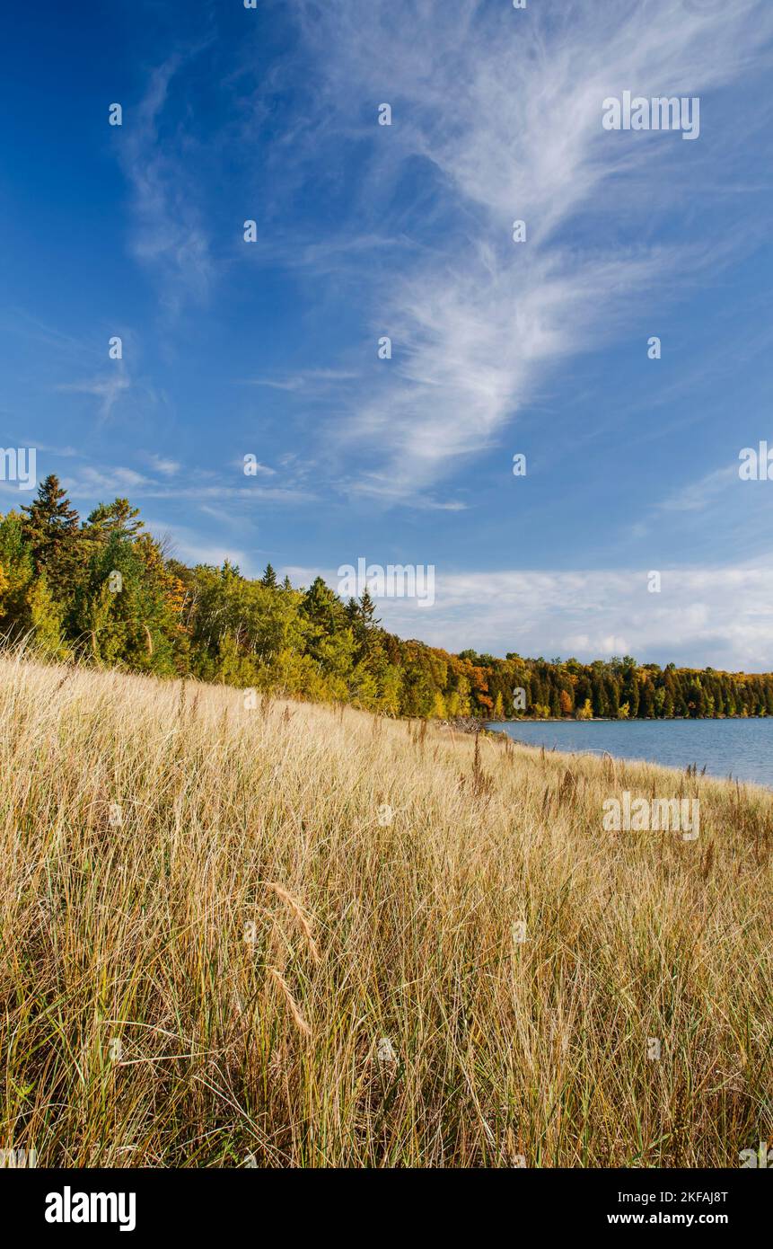 The shore of Newport Bay shows autumn color, Lake Michigan, Door County ...
