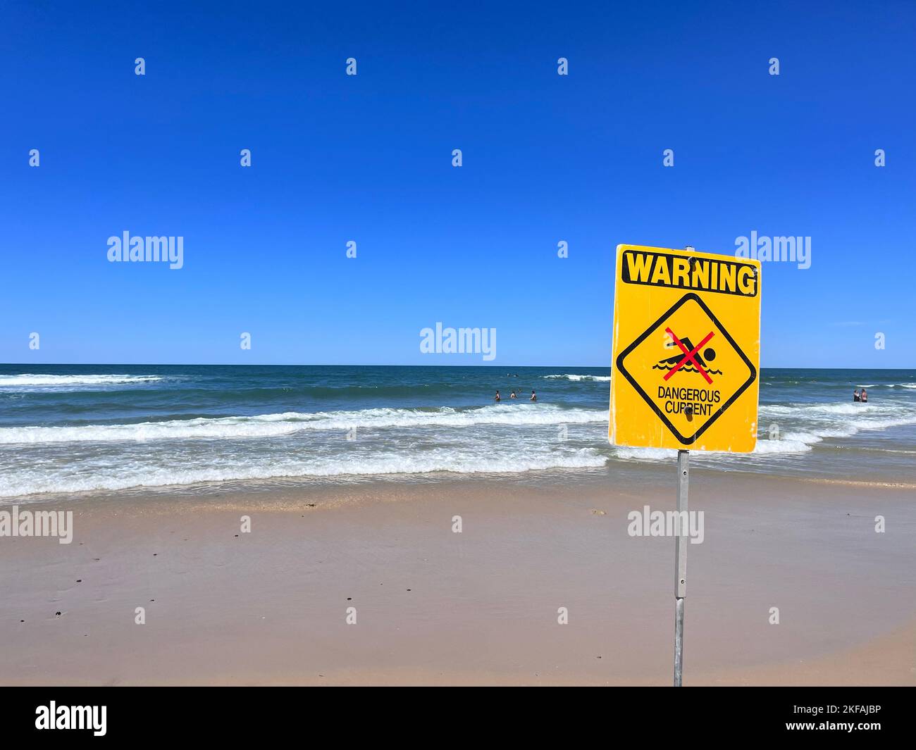 A beautiful shot of a symbol of warning about danger near the sea Stock ...
