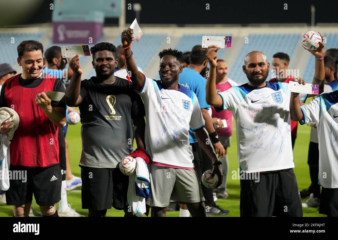 Players from the Workers' Welfare 'Team 360' with signed shirts and ...