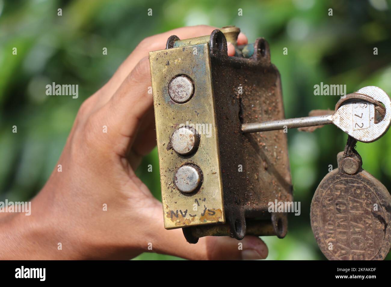 Used Door lock with double lock system held in hand with keys Stock ...