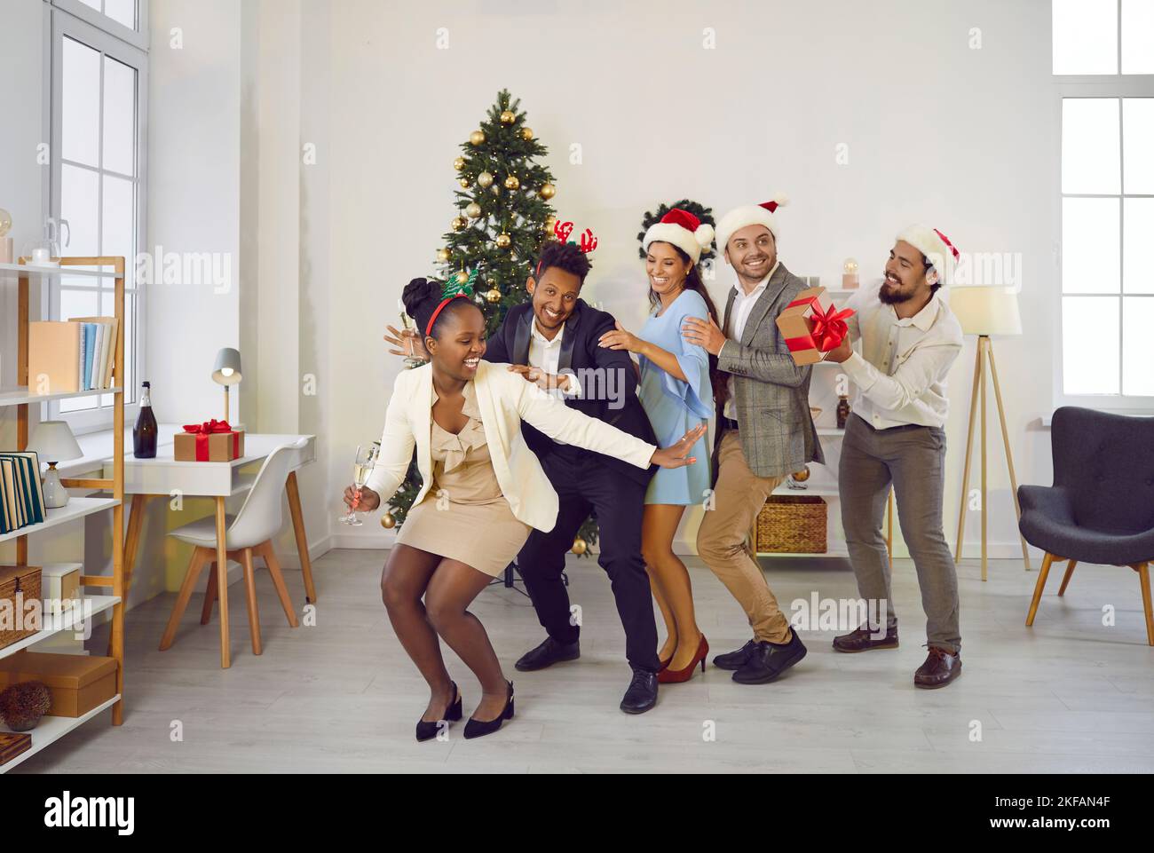 Group conga line dance hi-res stock photography and images - Alamy