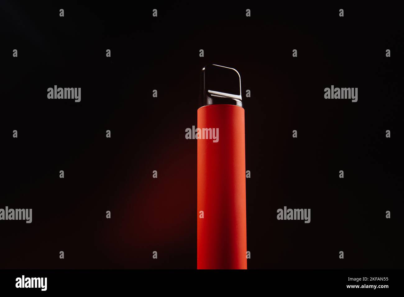 Red Disposable E Cigarette On A Dark Background Electronic Vape An Alternative To Smoking