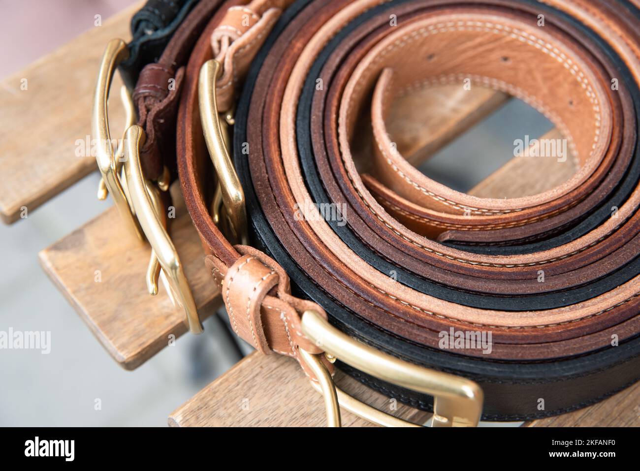 Leather belts set. natural lighting Stock Photo - Alamy