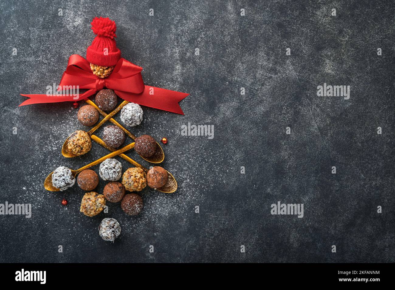 Christmas tree made of chocolate truffles, hazelnuts, anise stars ...