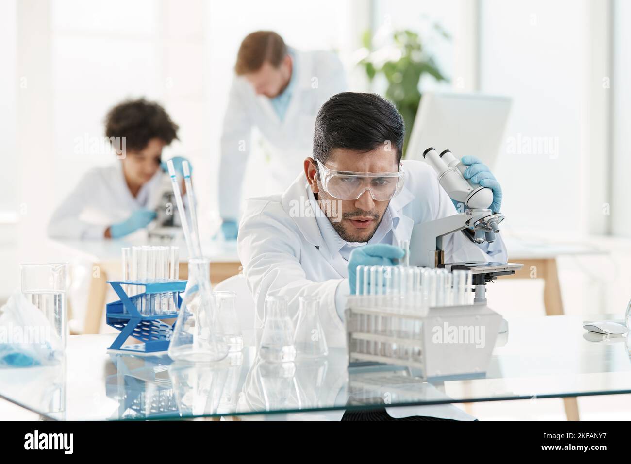 scientist and his colleagues work in a medical laboratory Stock Photo ...