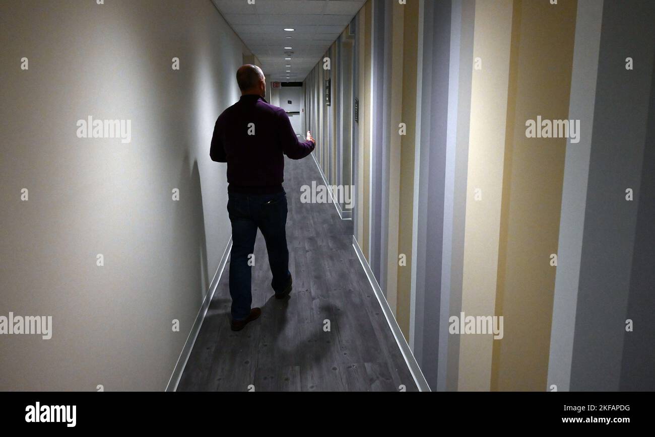 Tim O'Ferrall, general manager of Fort Meade Alliance, walks down a ...