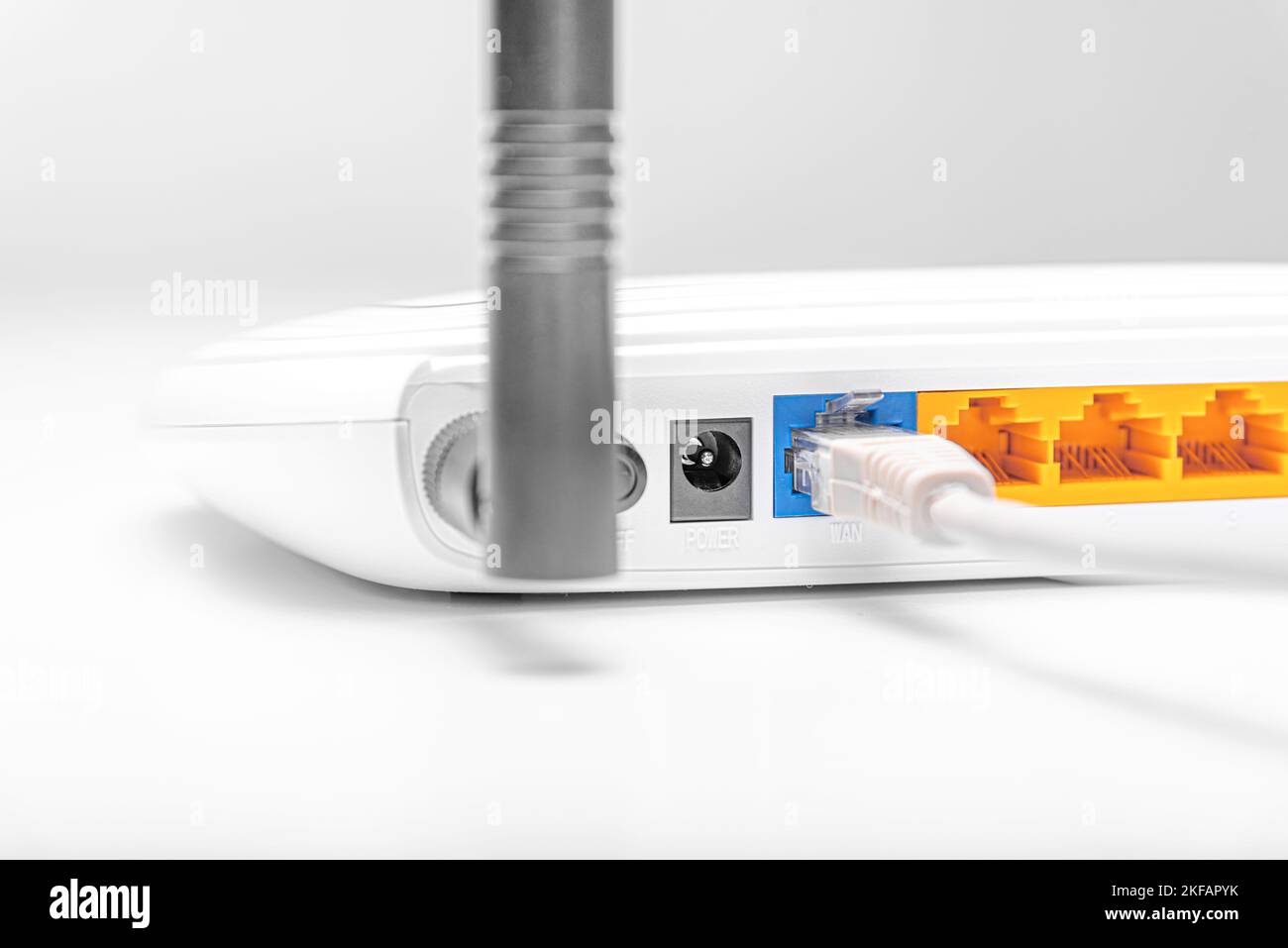 White Wi-Fi router for connecting devices to the Internet Stock Photo ...