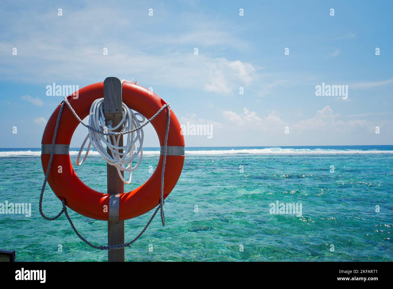 A life preserver on beach Stock Photo - Alamy
