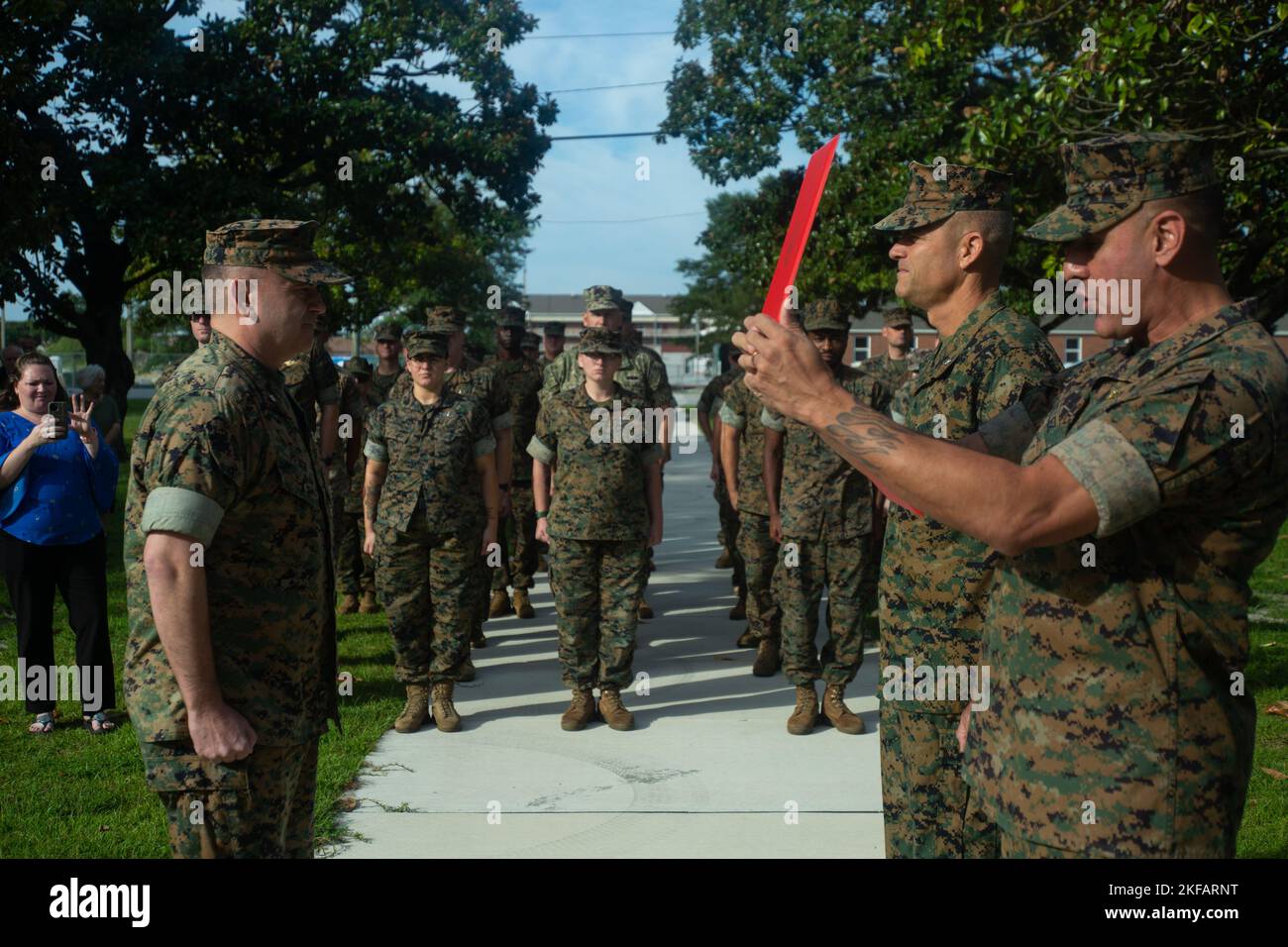 U.S. Navy Cmdr. James M. Peugh, left, the command chaplain with Marine ...