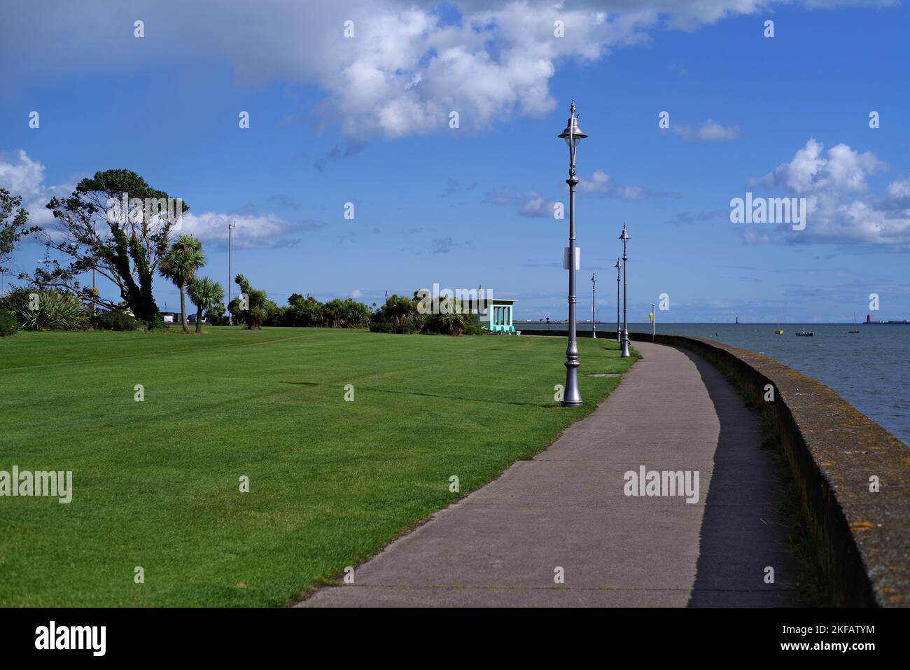 Clontarf Promenade Park situated along Dublin Bay on sunny summer day ...