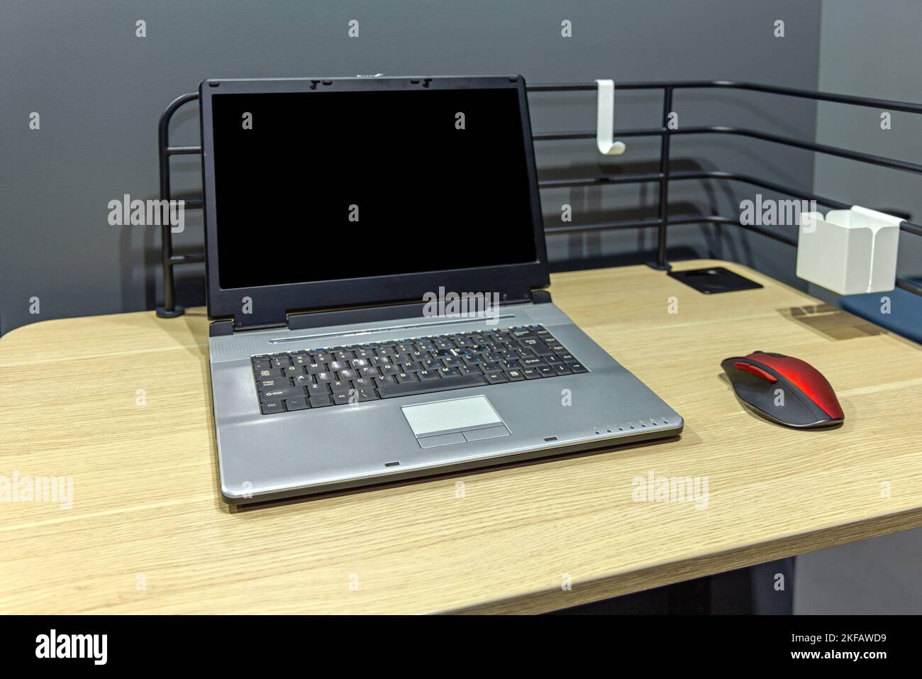 Notebook Computer With Wireless Mice at Small Wooden Desk Workplace ...