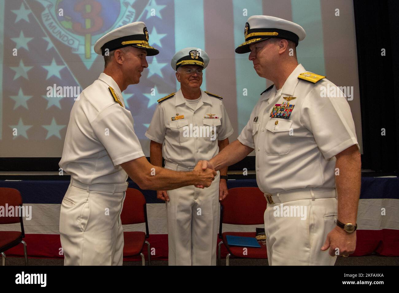 Rear Adm. Jeffrey Anderson, commander, Carrier Strike Group (CSG) 3, and Rear Adm. Kevin Lenox ...