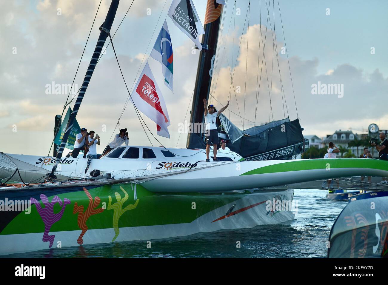 French skipper Thomas Coville celebrates onboard his Ultim multihull ...