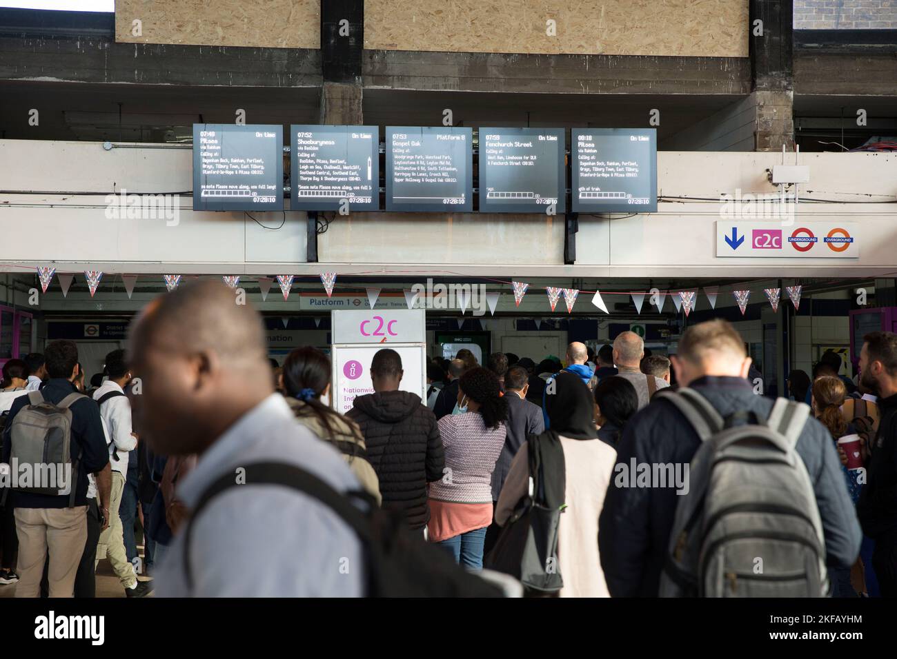 Passengers wait at Barking Station in East London in the morning as the ...
