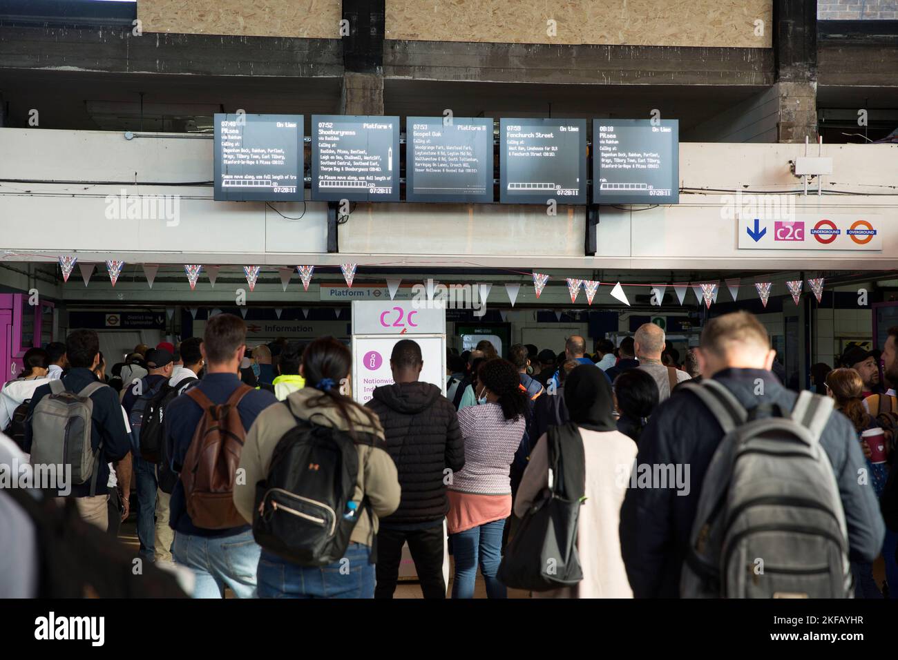 Passengers wait at Barking Station in East London in the morning as the ...